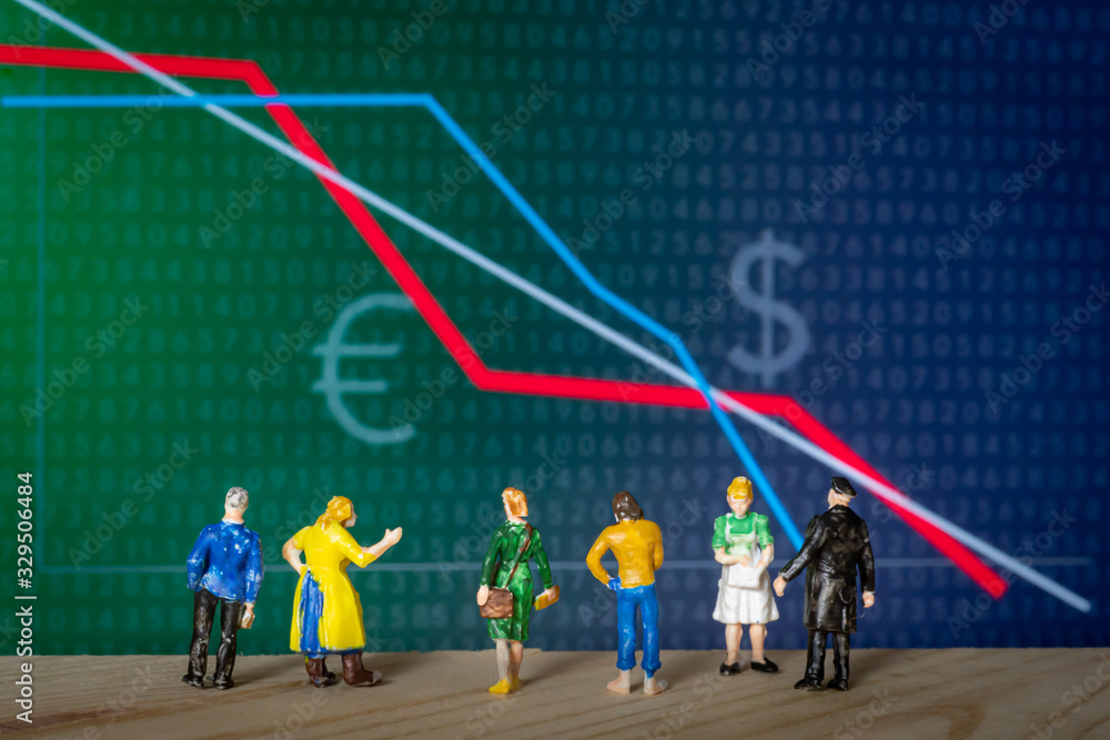 Figurines right before a negative stock exchange chart Stock Photo ...