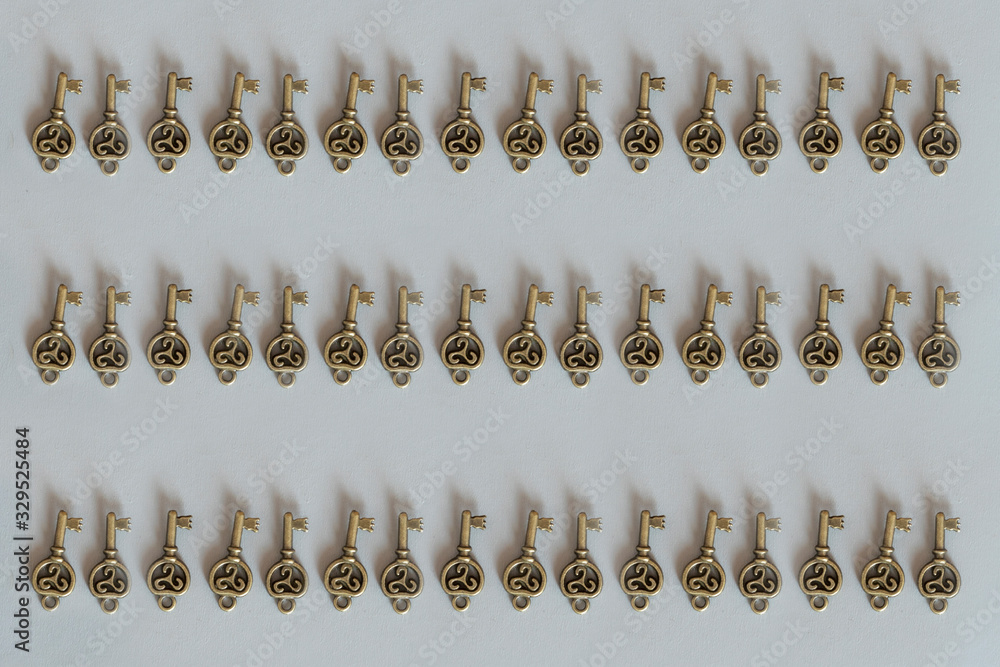 Top down view of bronze color keys pattern layout isolated on white ...