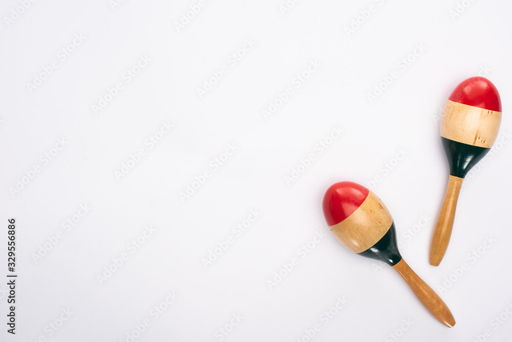 Top view of wooden colorful maracas on white background Stock Photo ...