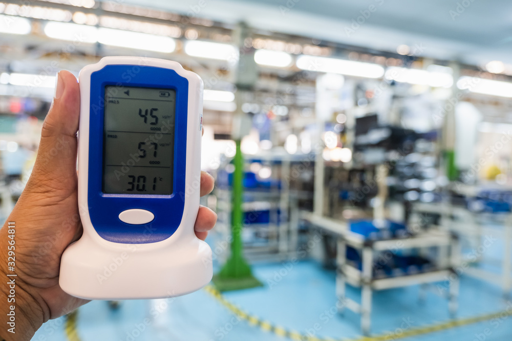 Measurement dust PM 2.5 measure In office Exceed the standard pollution ...