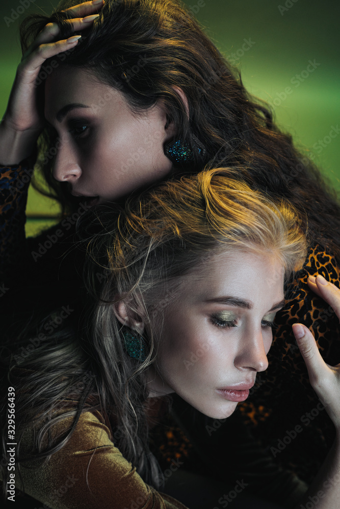 Fashion photo session in the studio. Beautiful woman model. Yellow ...