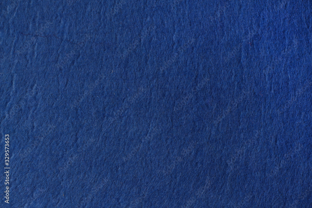 Classic blue felt background. The surface of the fabric texture. Stock ...