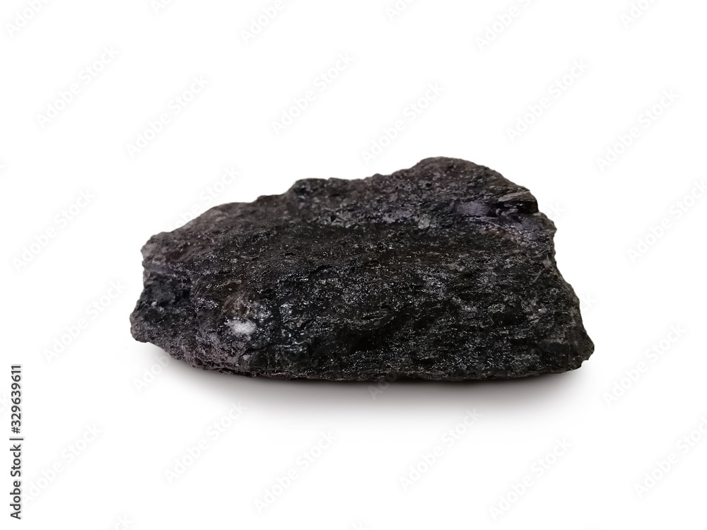 Lignite coal on white background. Lignite is a soft, brown, combustible ...