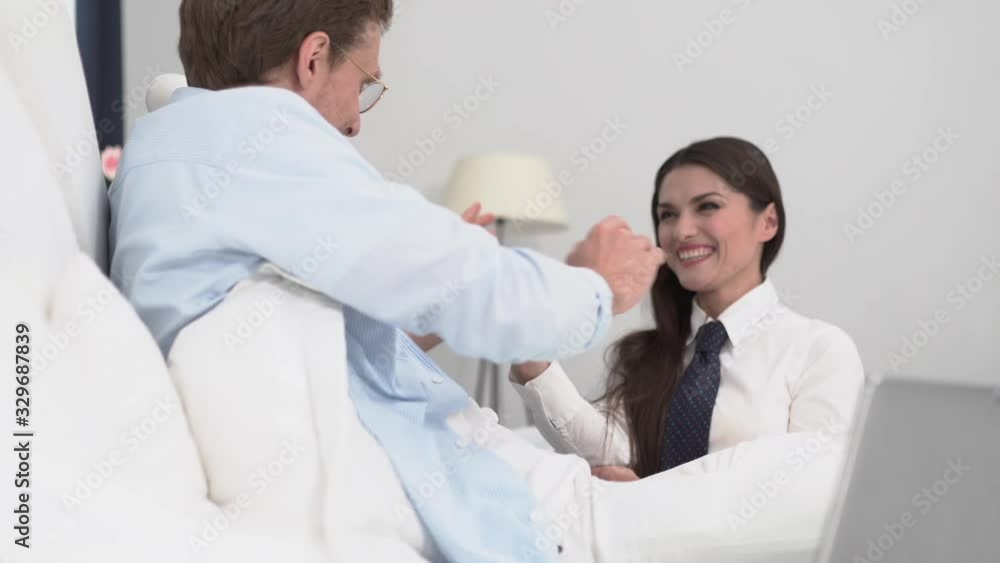 A Smiling Female Stands On One Knee And Makes A Proposal To Her Close ...