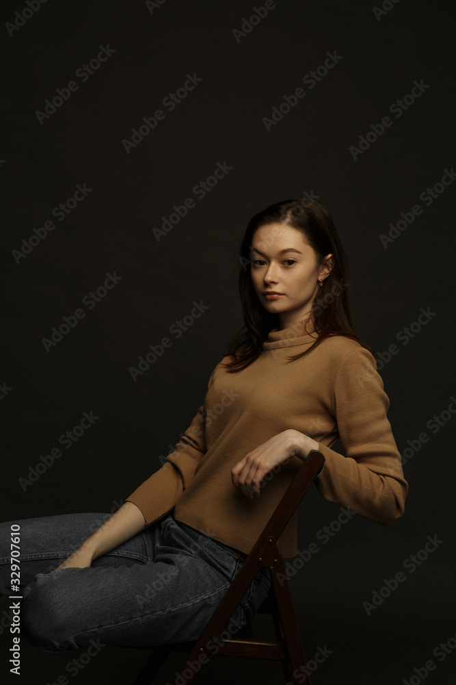 Professional model and posing. Model tests of a girl in a Studio with a ...