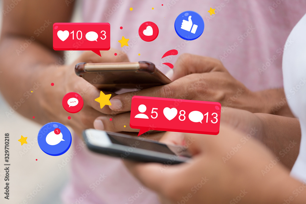 Cropped shot of young people using smartphones. Closeup shot of hands ...