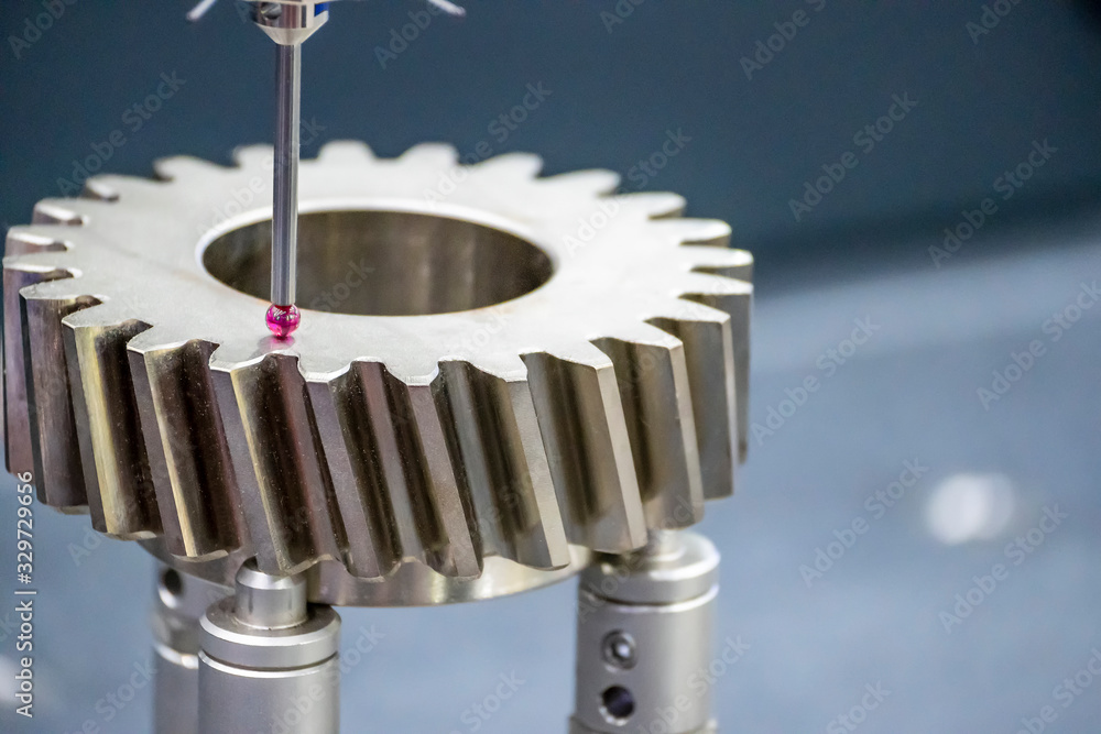 The multi-axis,CMM touch probe measure dimension of the transmission ...