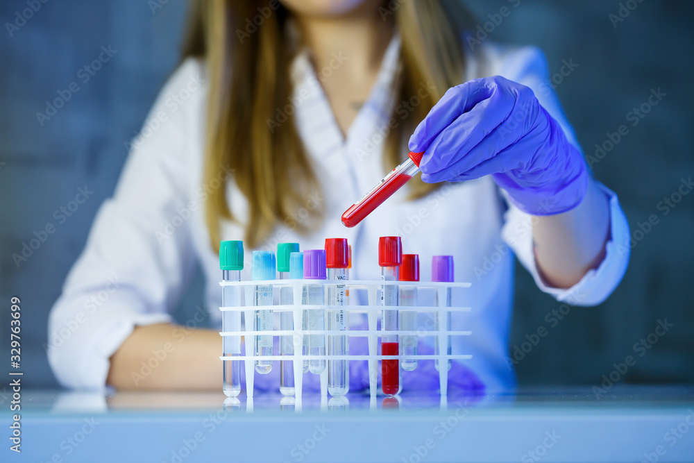 A medical professional, laboratory assistant, doctor performs an ...