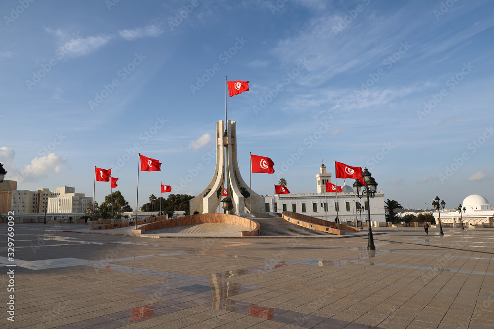 Tunisian flags flying in the wind on the Kasbah square in Tunis Stock ...