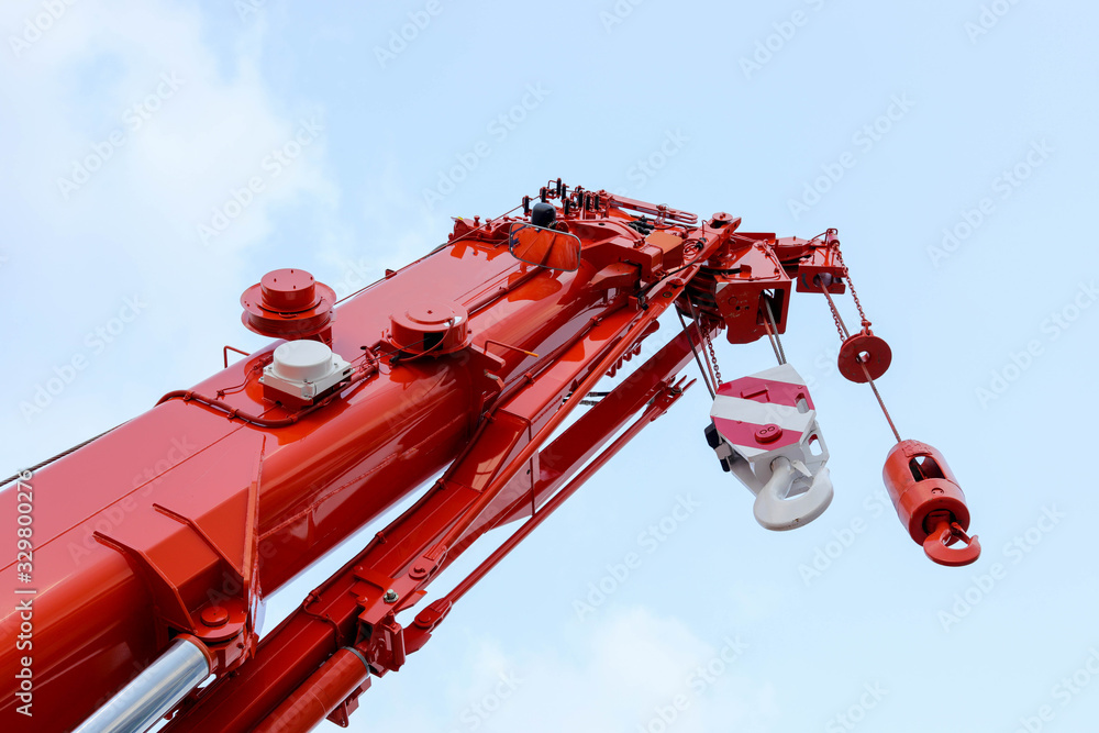 Mobile crane on blue sky background. Stock Photo | Adobe Stock