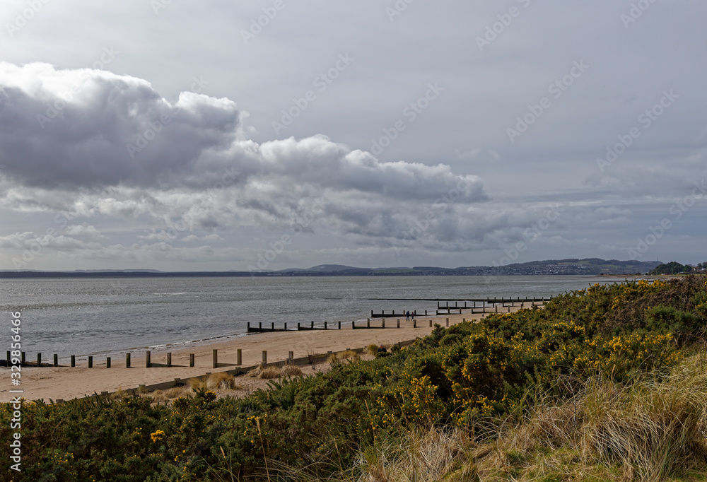 Monifieth Beach with its Wooden Groynes facing out into the Tay estuary ...