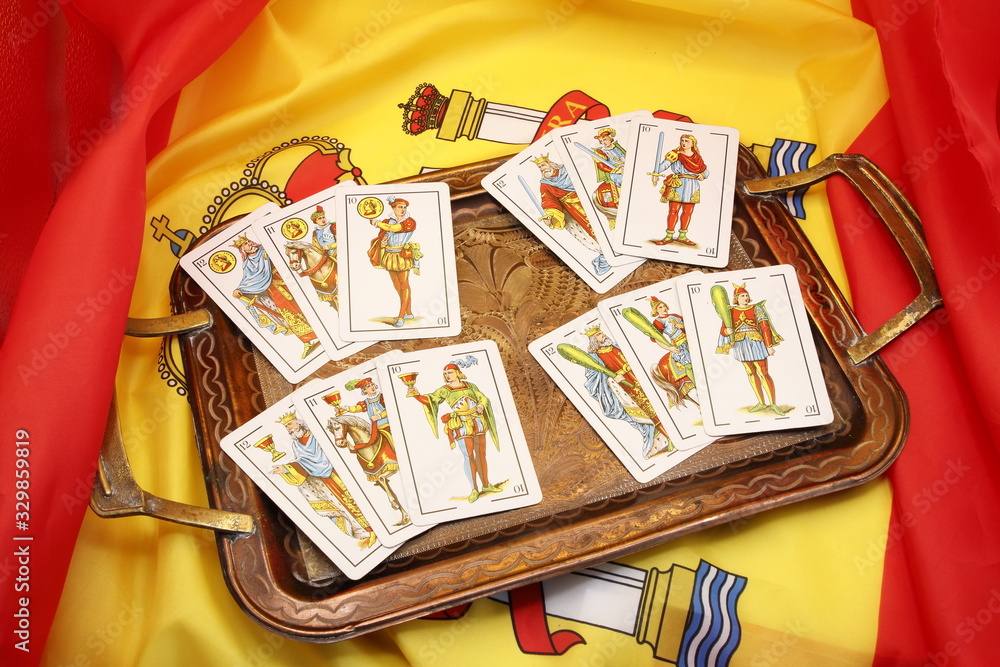 the figures of the four suits of the Spanish deck of cards, on a silver ...