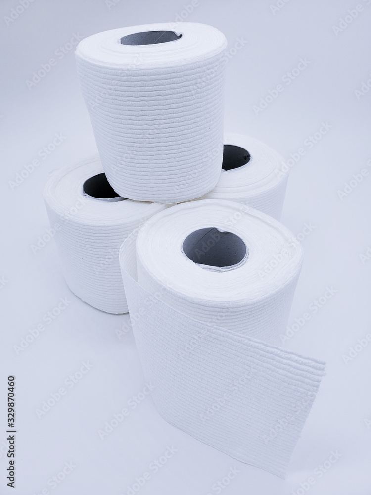 Toilet paper roles on a white background Stock Photo | Adobe Stock