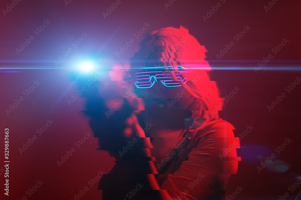 Girl with blaster in the futuristic battle. Concept virtual reality ...