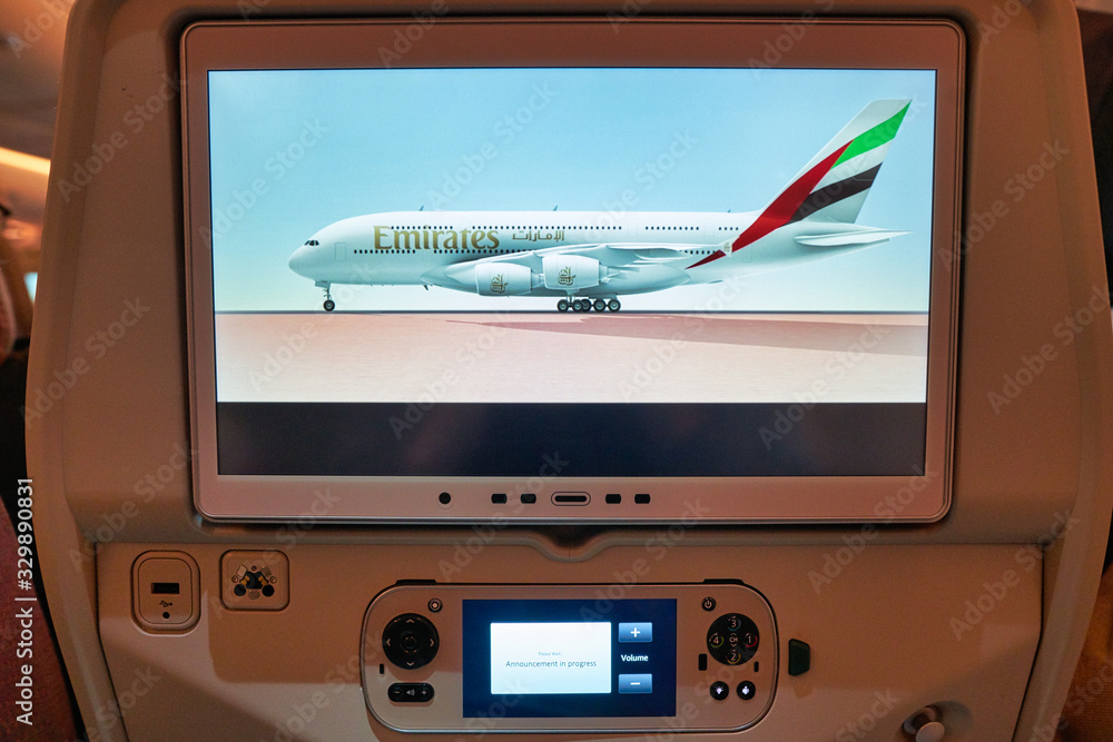 DUBAI, UAE - CIRCA JANUARY 2019: close up shot of a seat-back screen ...