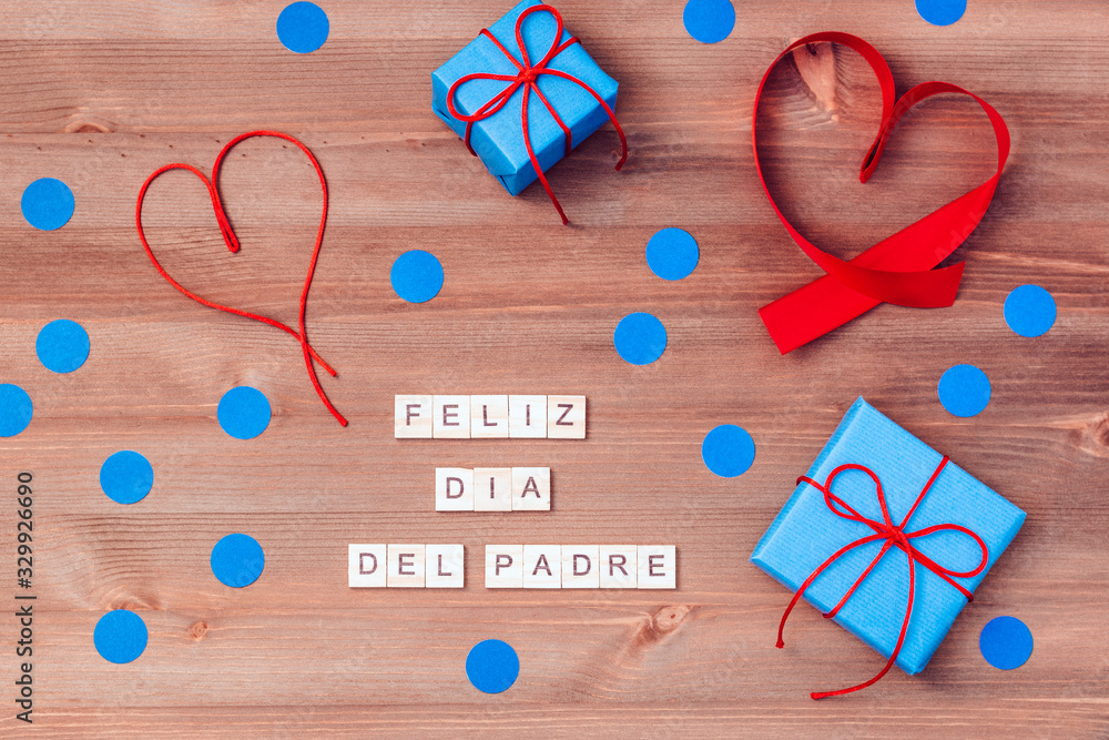 Feliz Dia Del Padre Words Made Of Wooden Blocks With Blue Gift Boxes