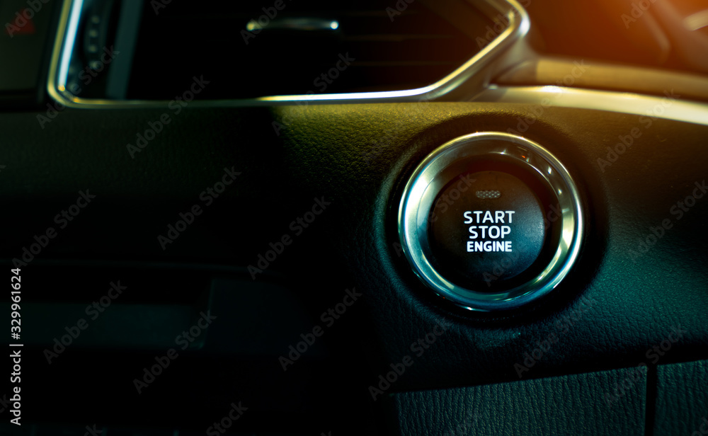 Start stop engine button of luxury car. Push up button for start or ...
