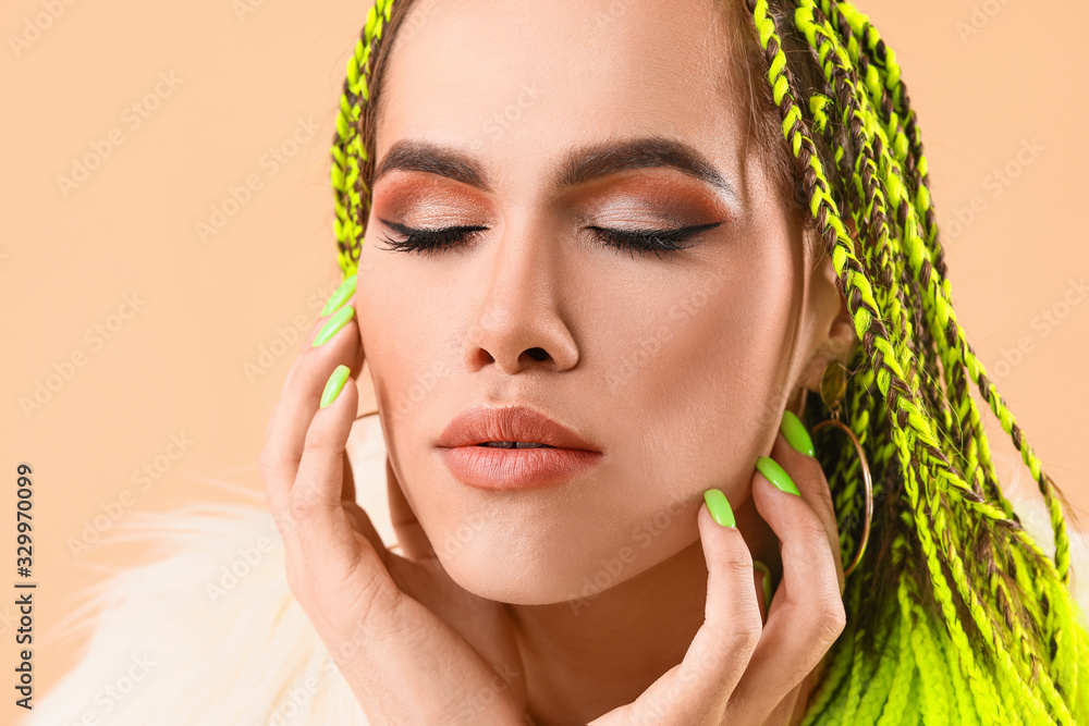 Portrait of young transgender woman on color background Stock Photo ...