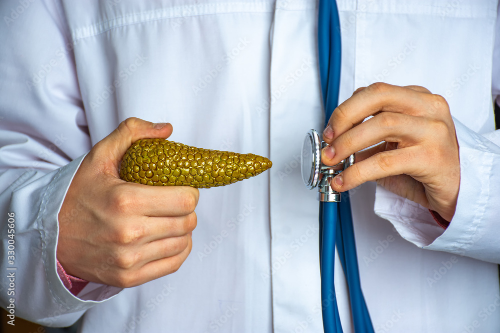 Concept photo of diagnosis in gastroenterology. Doctor hold in one hand ...