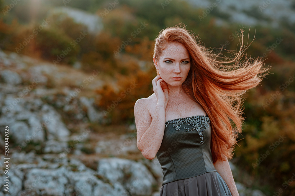 beautiful furious scandinavian warrior ginger woman in grey dress Stock ...