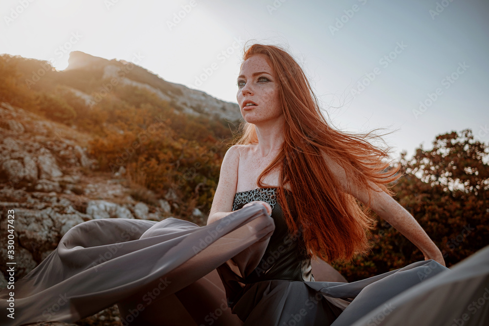 beautiful furious scandinavian warrior ginger woman in grey dress Stock ...