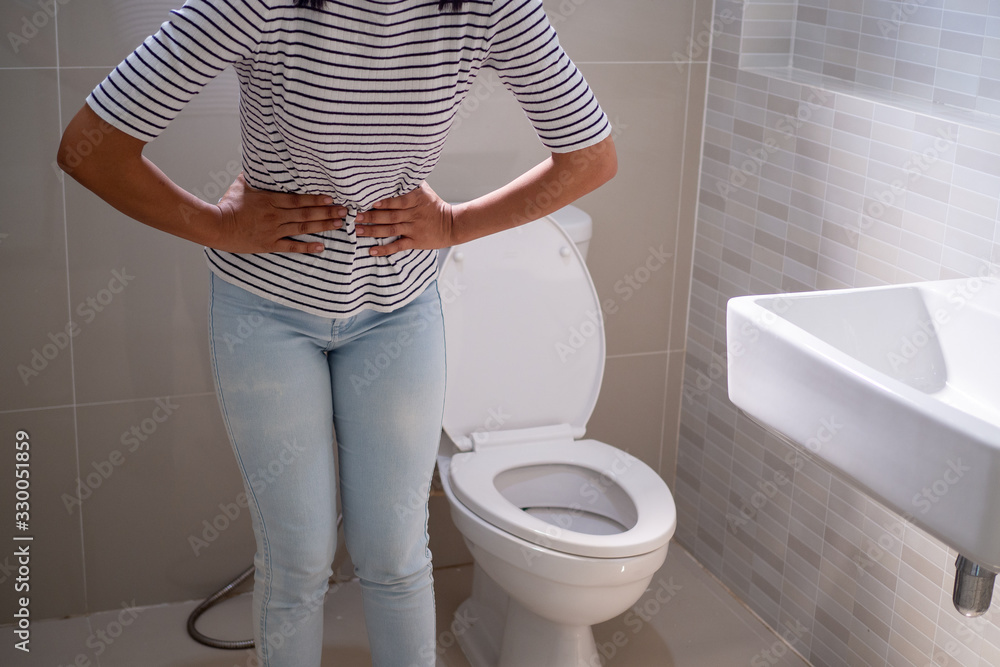 Woman stood in the bathroom in the toilet. With severe diarrhea Use ...