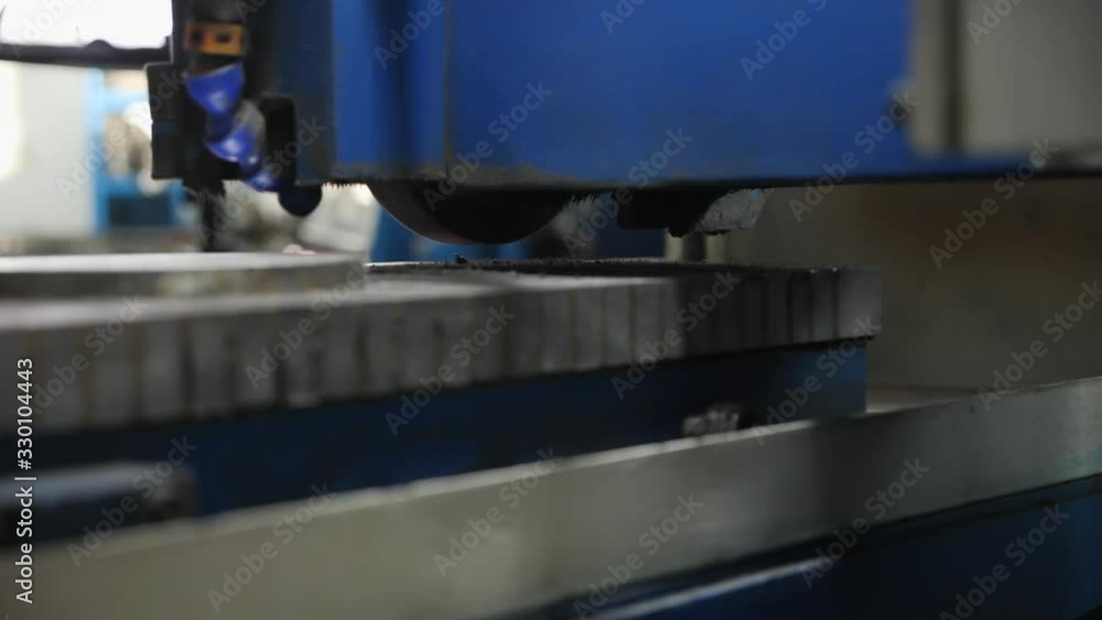 Swinging bench industrial grinding machine works on steel workpiece ...