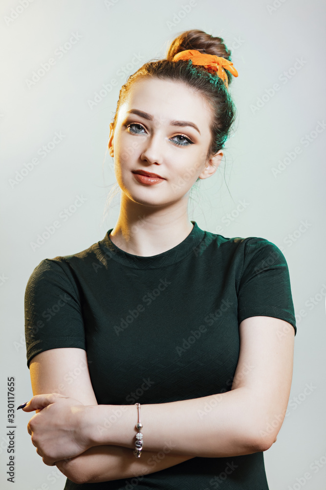 portrait of confident beautiful girl with with hairstyle on studio ...