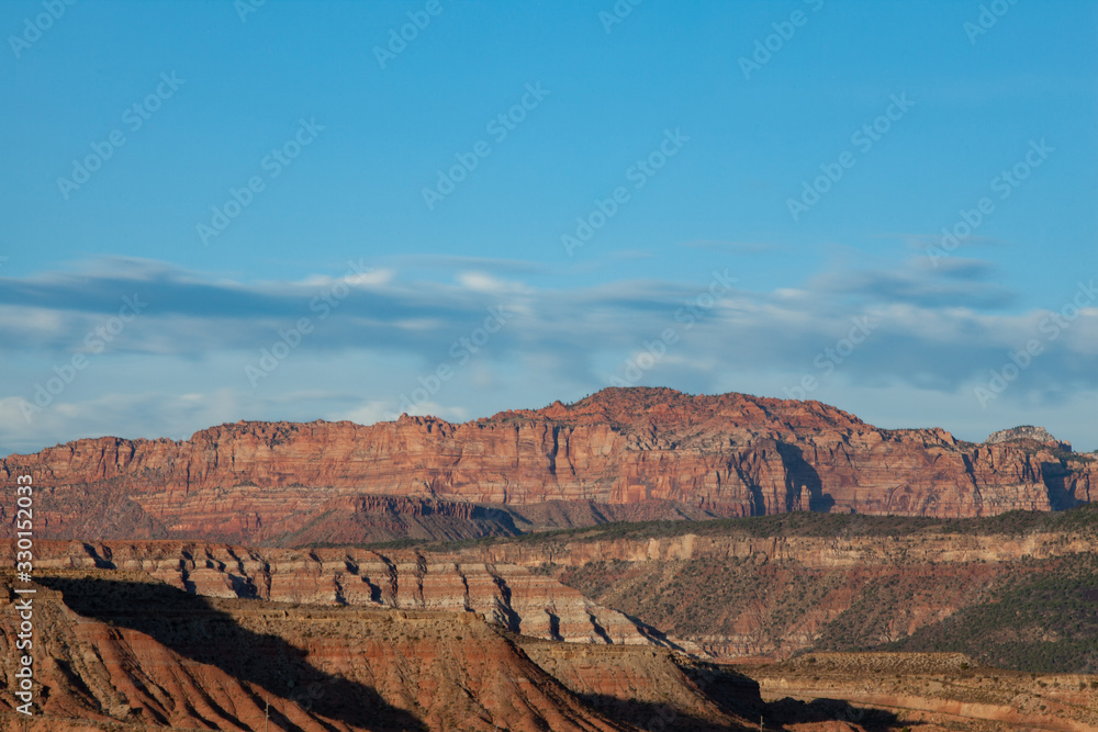 Under a soft sky amazing view of a canyon cliff in Utah, United States ...
