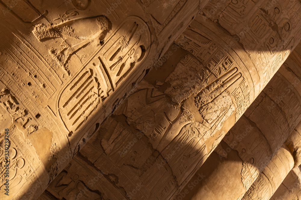 Karnak Temple, complex of Amun-Re. Embossed hieroglyphics on columns ...