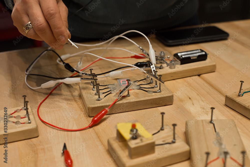 Hands on STEM education activity. Science lesson with hand made ...