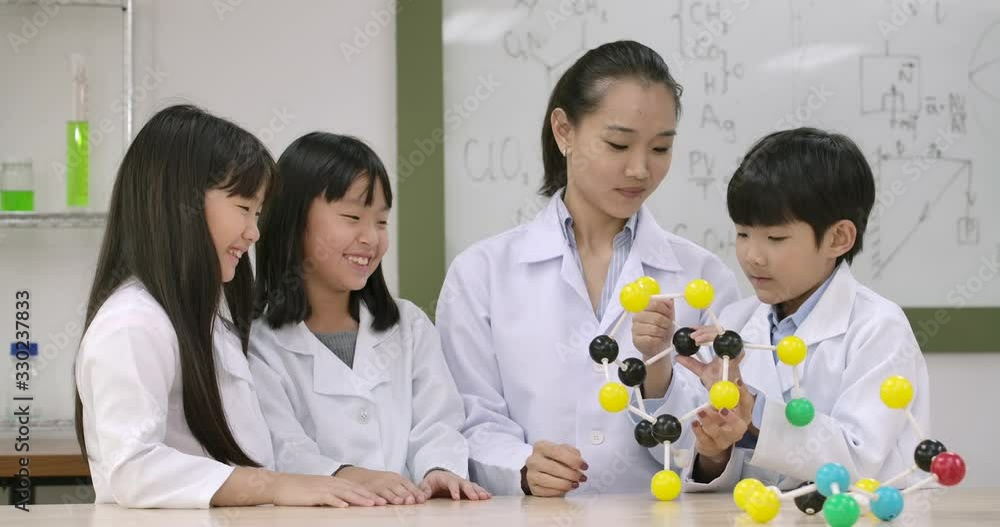 Teacher teaching children collect molecules and conduct chemical ...