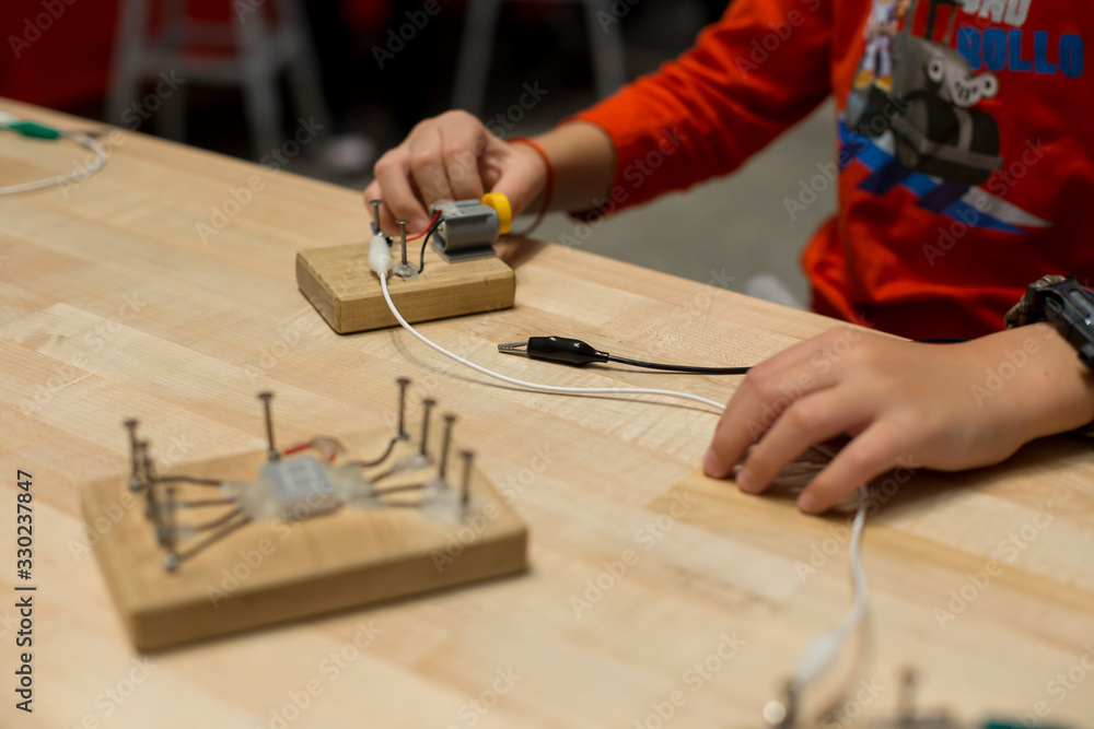 Hands on STEM education activity. Science lesson with hand made ...