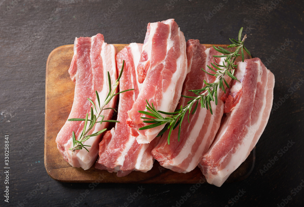 fresh pork ribs with rosemary, top view Stock Photo | Adobe Stock