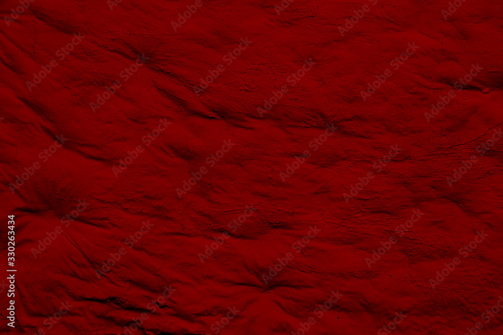 Background with a crumpled surface and the color of red-hot lava ...