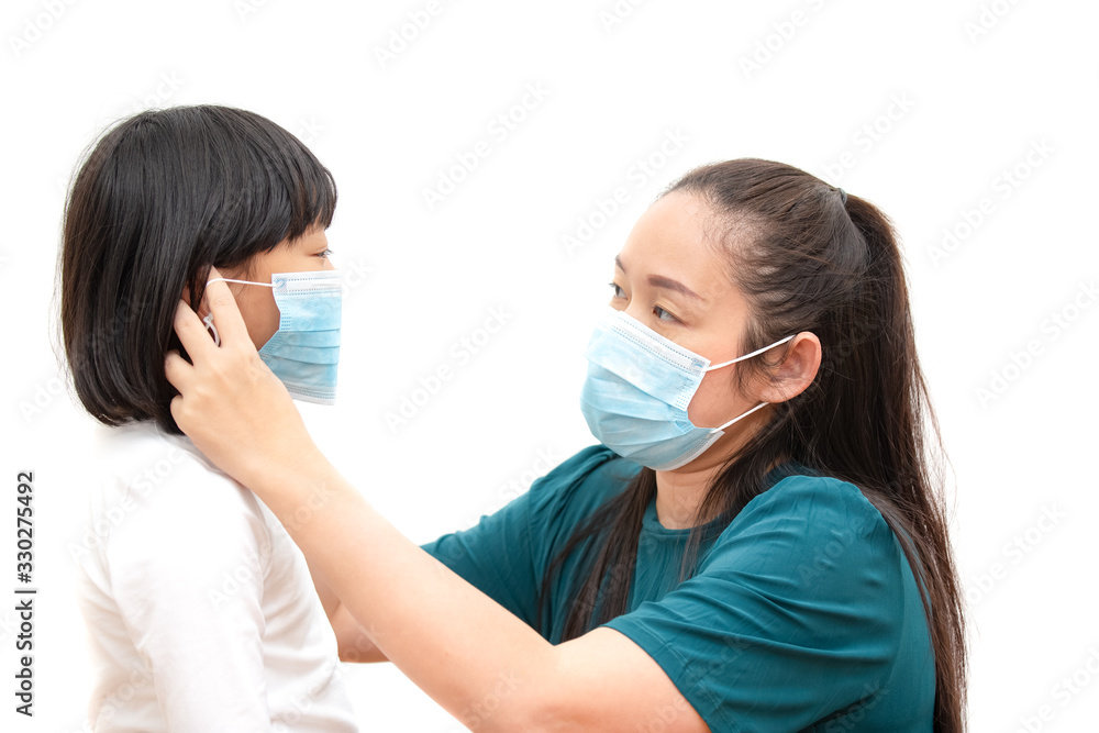 The image face of a Children Wearing a mask with Family to prevent ...