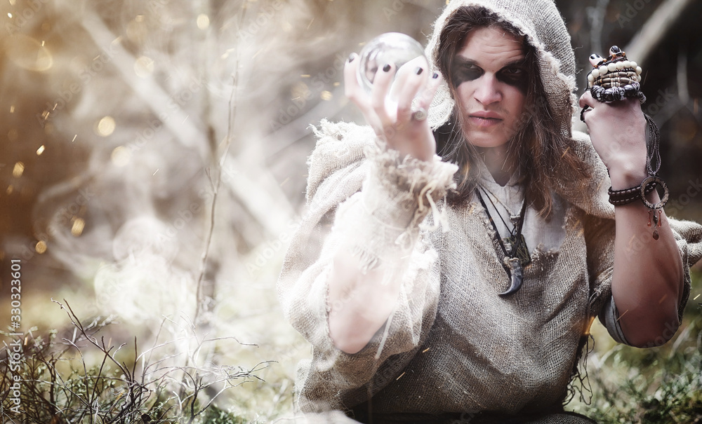 Fairy magician. A sorcerer with a glass sphere, a magical spell and a ...