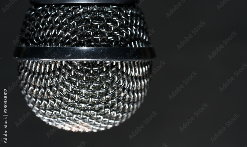 Microphones with wire mesh network photographed in the studio with ...