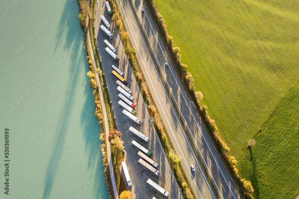 Top down aerial view of highway interstate road with fast moving ...