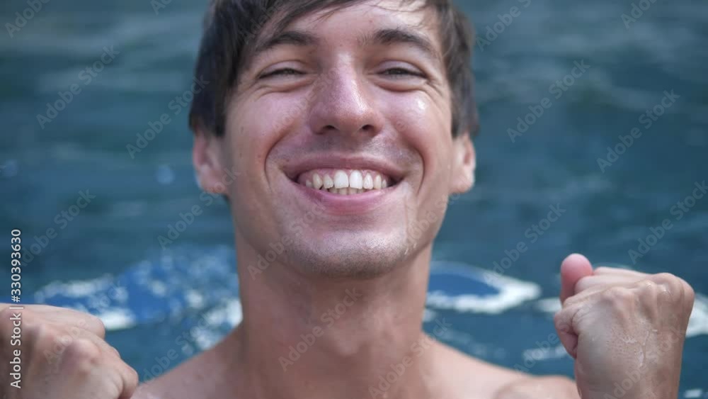 Video Stock Amazed Young Man Shocked Showing Yes Winner Gesture on ...