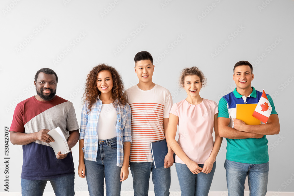 Students of language school on light background Stock Photo | Adobe Stock
