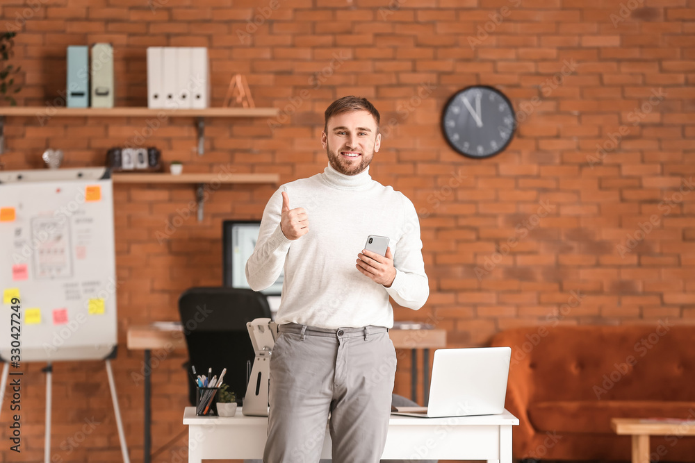 Portrait of male IT designer in office Stock Photo | Adobe Stock