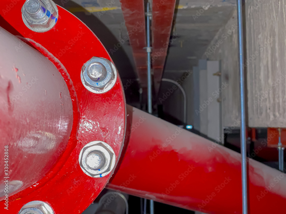 Blurred Fire pump system with big red pipe line system background Stock ...