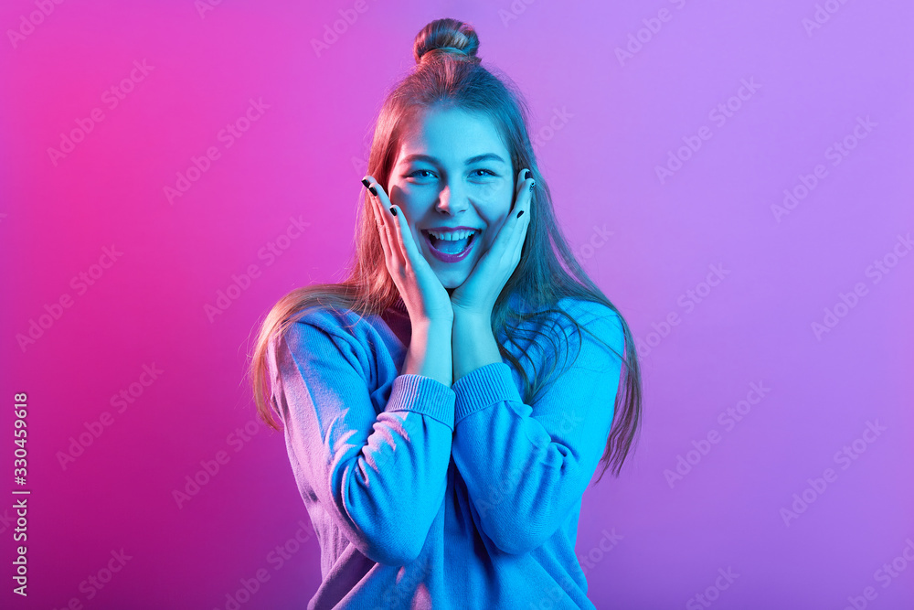Portrait of cheerful good looking cute female with long hair having ...