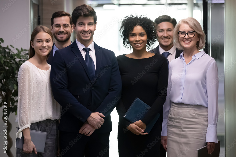 Group portrait of multiracial team banking specialists stand together ...
