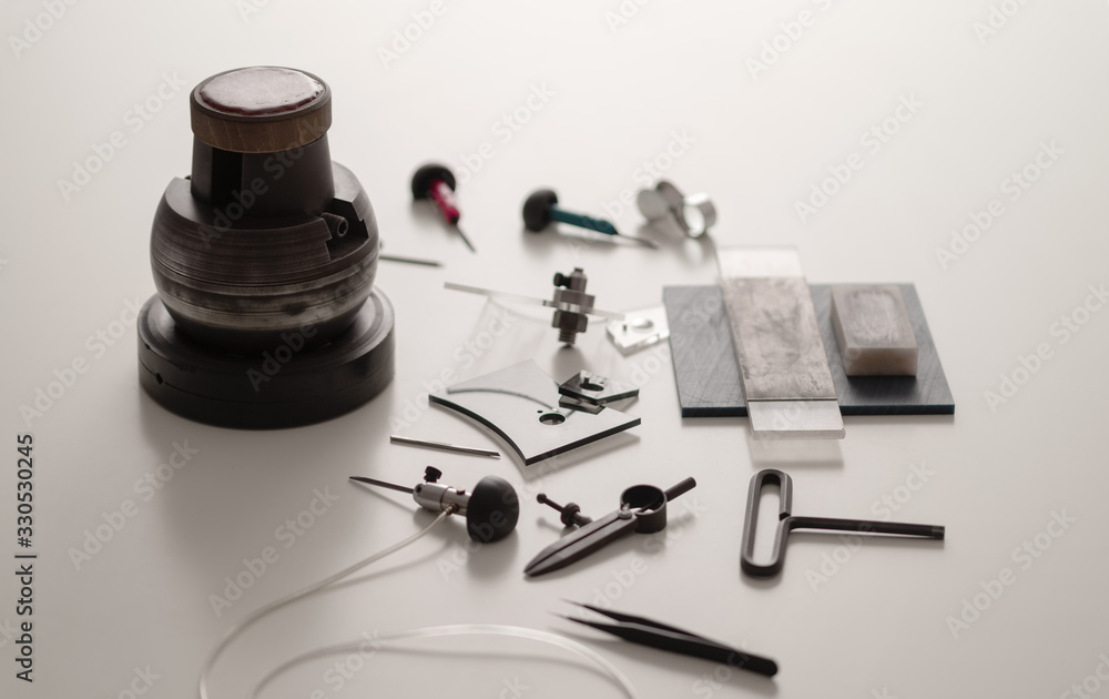 Various Engraver Tools On White Desk. Professional engraver equipment ...