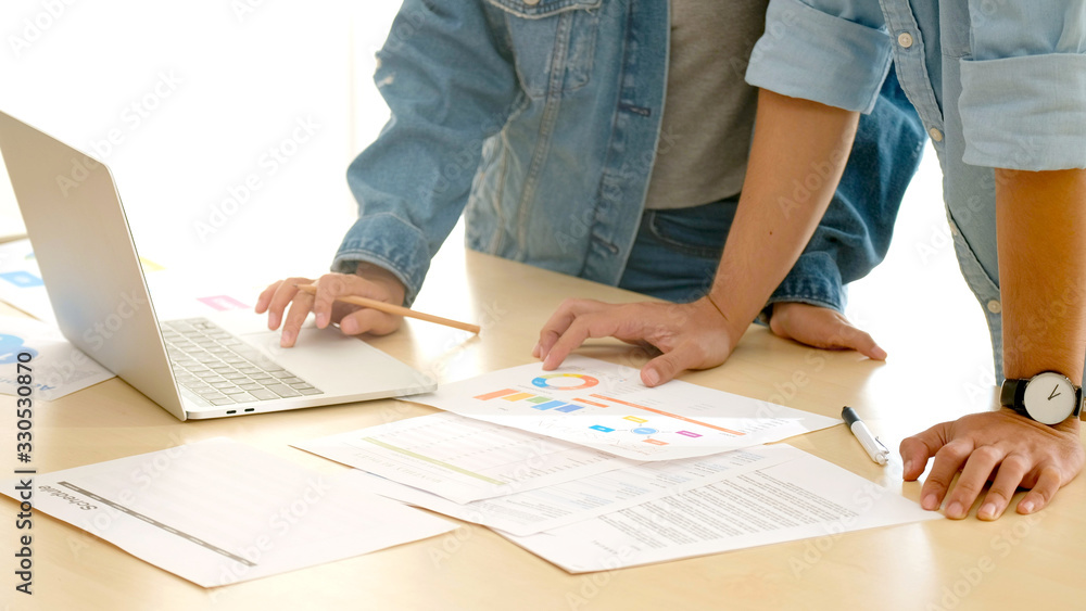 Young creative design meeting brainstorm ideas to plan and develop ...