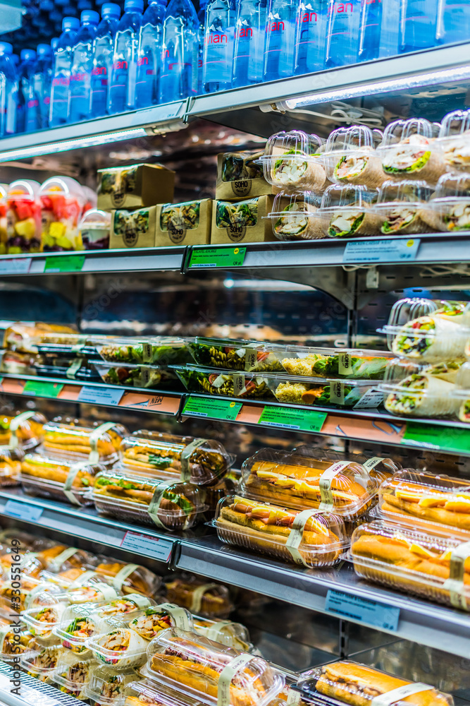 Pre-packaged foods displayed in a commercial refrigerator Stock Photo ...