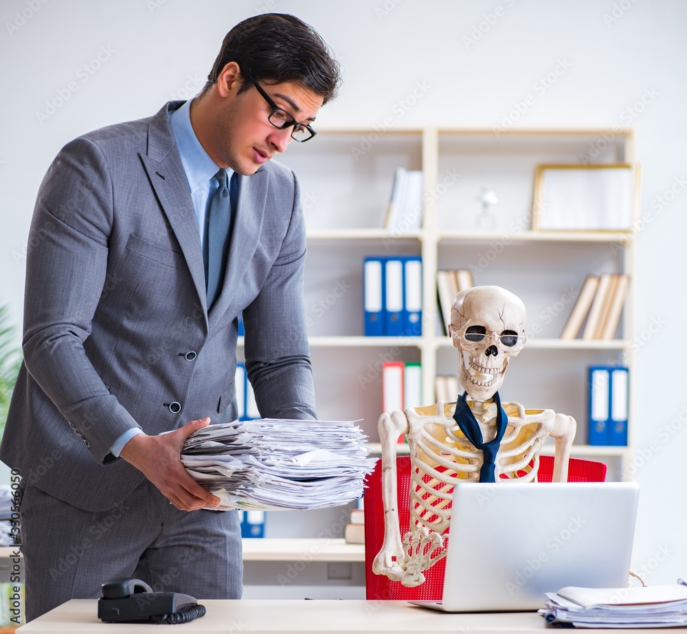 Angry boss yelling at his skeleton employee Stock Photo | Adobe Stock