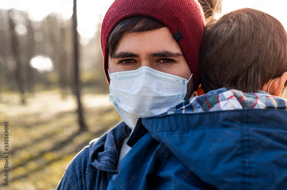 Father and son using air masks Stock Photo | Adobe Stock
